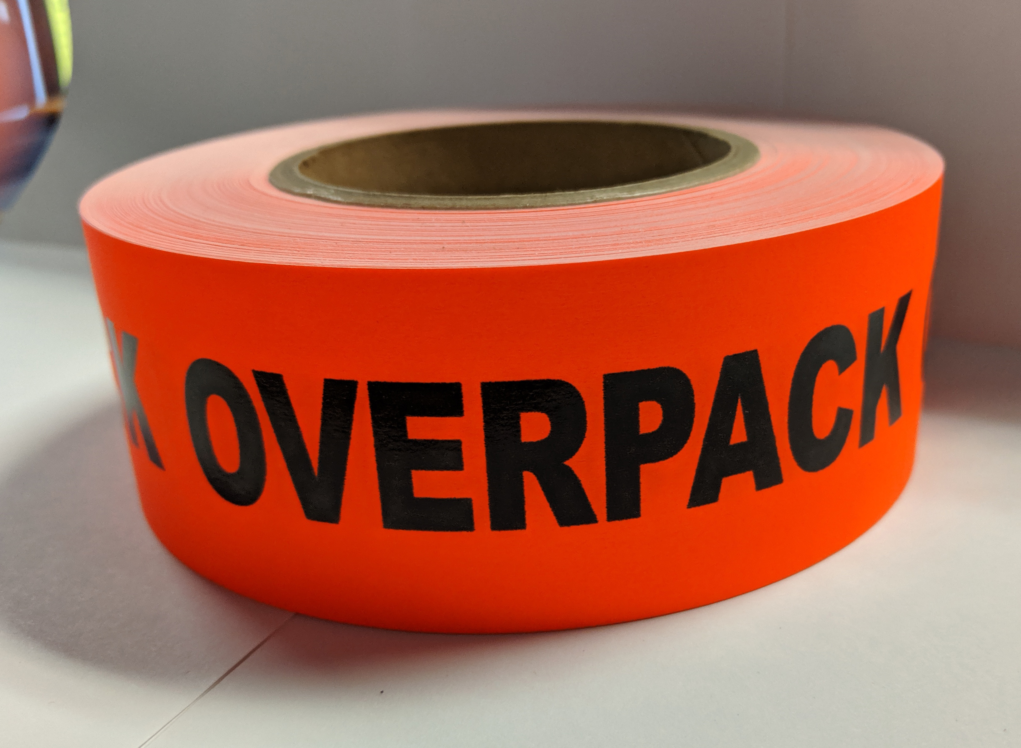 Pal Group » LBL 2" x 5" OVERPACK Fl.Red (500/rl)